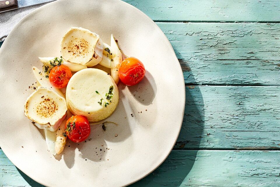 Asparagus flan with gratinated goat cheese and melted vine tomatoes ...