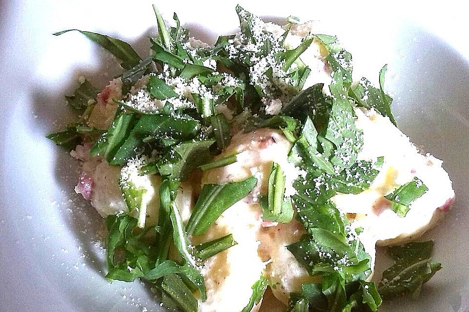 Mini dumplings in cream cheese sauce with arugula and Parmesan | Chef ...