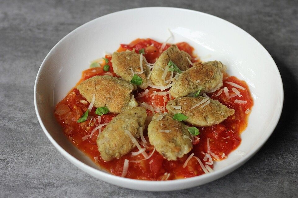 Fried semolina dumplings on tomato vegetables | Chef Reader